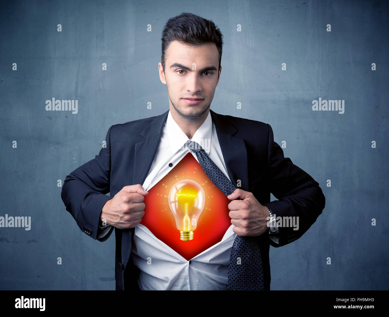 Superhero man ripping open shirt hi-res stock photography and images ...