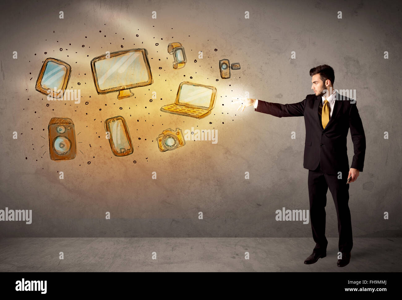 Man throwing hand drawn electronical devices Stock Photo - Alamy