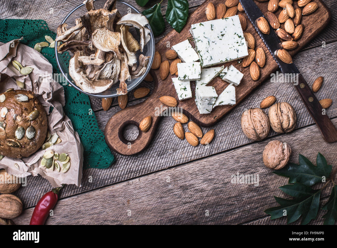 rustic style cheese with bread, cep and nuts. Food photo Stock Photo ...