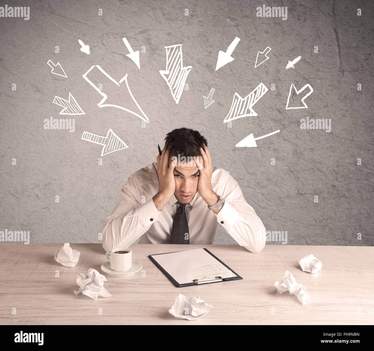 Busy office worker with drawn arrows Stock Photo - Alamy