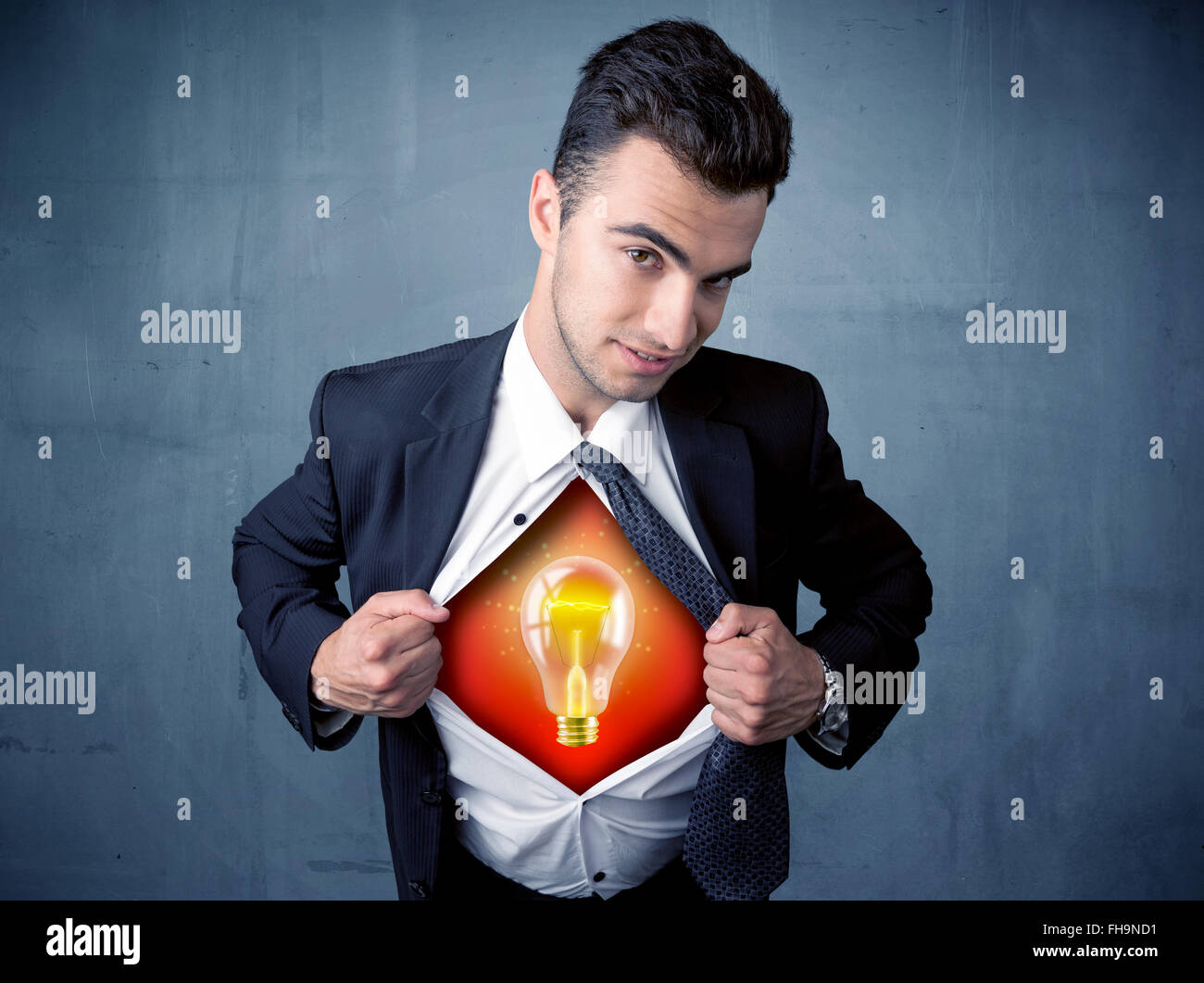 Superhero man ripping open shirt hi-res stock photography and images ...