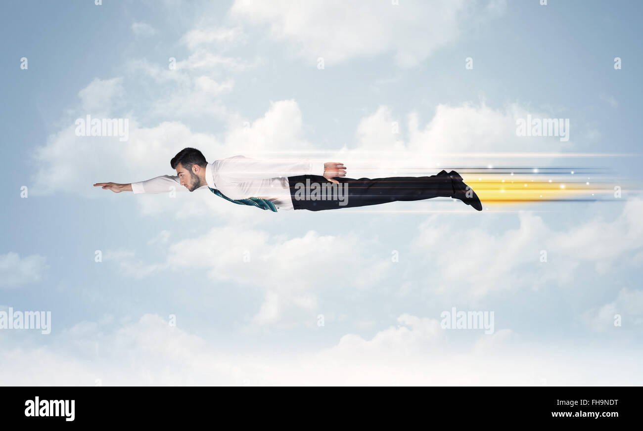 Happy business man flying fast on the sky between clouds Stock Photo ...