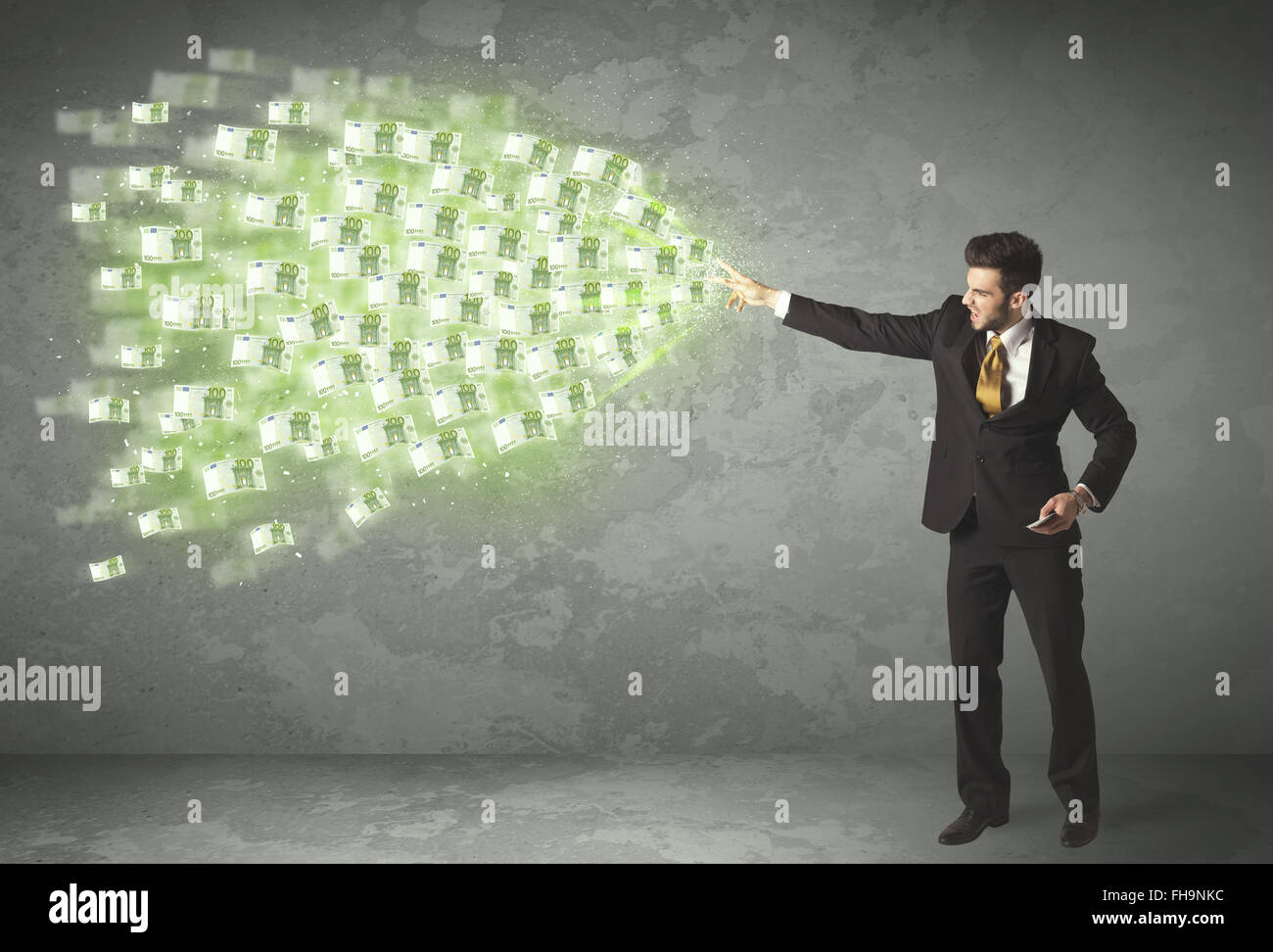 Young business person throwing money concept Stock Photo - Alamy