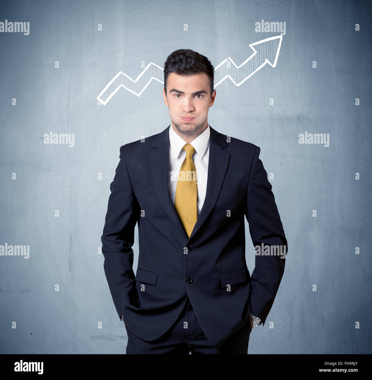 Smiling business guy with graph arrow Stock Photo - Alamy