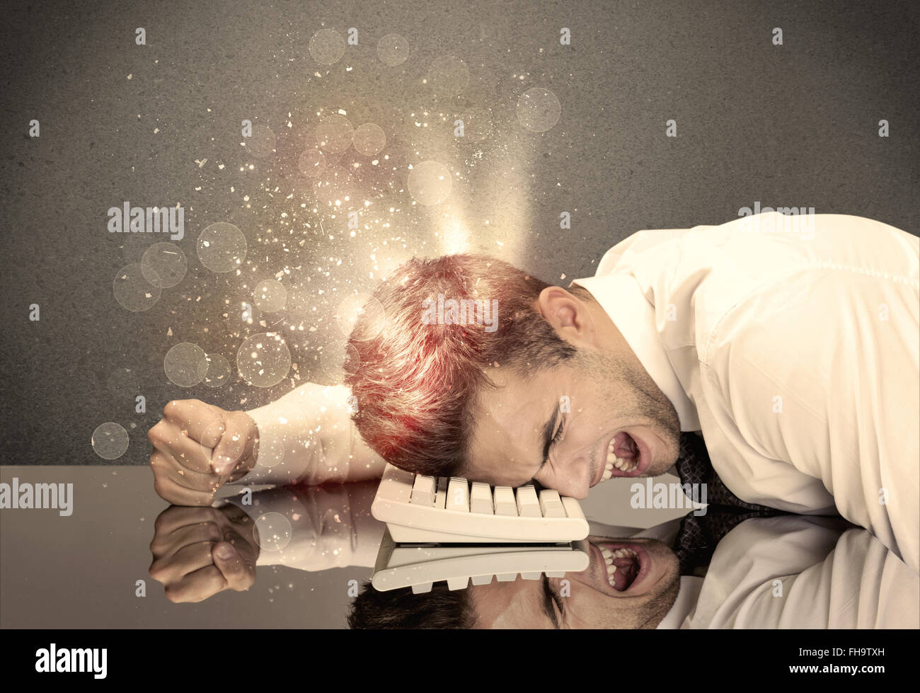 Angry businessman lights keyboard hi-res stock photography and images ...