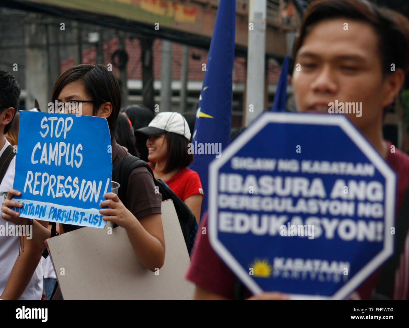 Manila, Philippines. 24th Feb, 2016. A student displays placard during ...