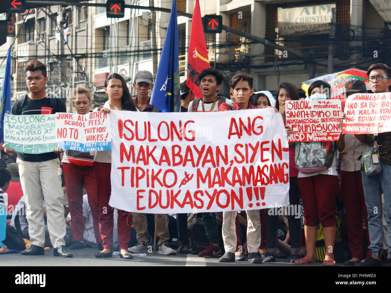 Manila, Philippines. 24th Feb, 2016. Students hold placards at a ...