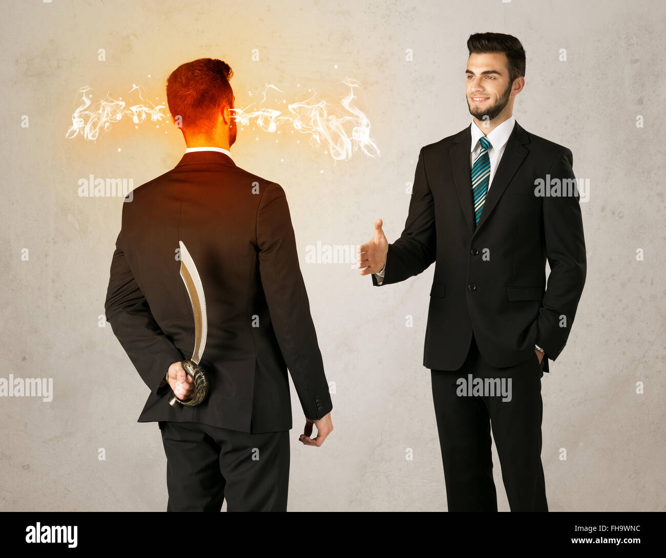 Angry businessman with weapon Stock Photo - Alamy