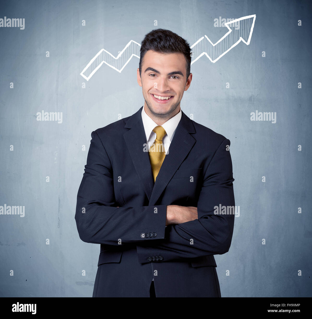 Smiling business guy with graph arrow Stock Photo - Alamy
