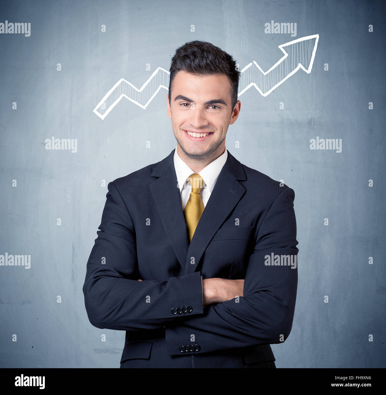 Smiling business guy with graph arrow Stock Photo - Alamy