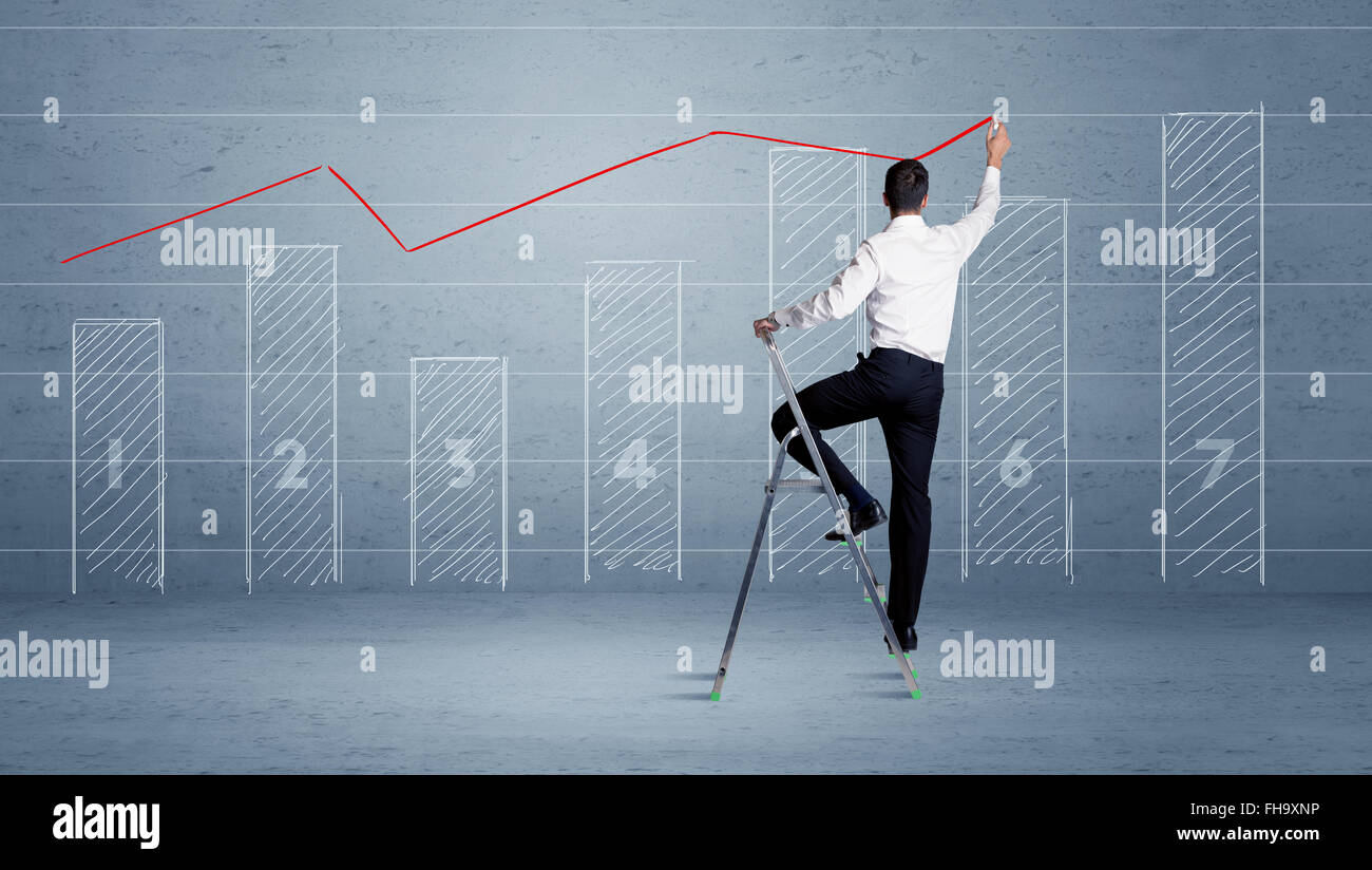 Man drawing chart from ladder Stock Photo - Alamy