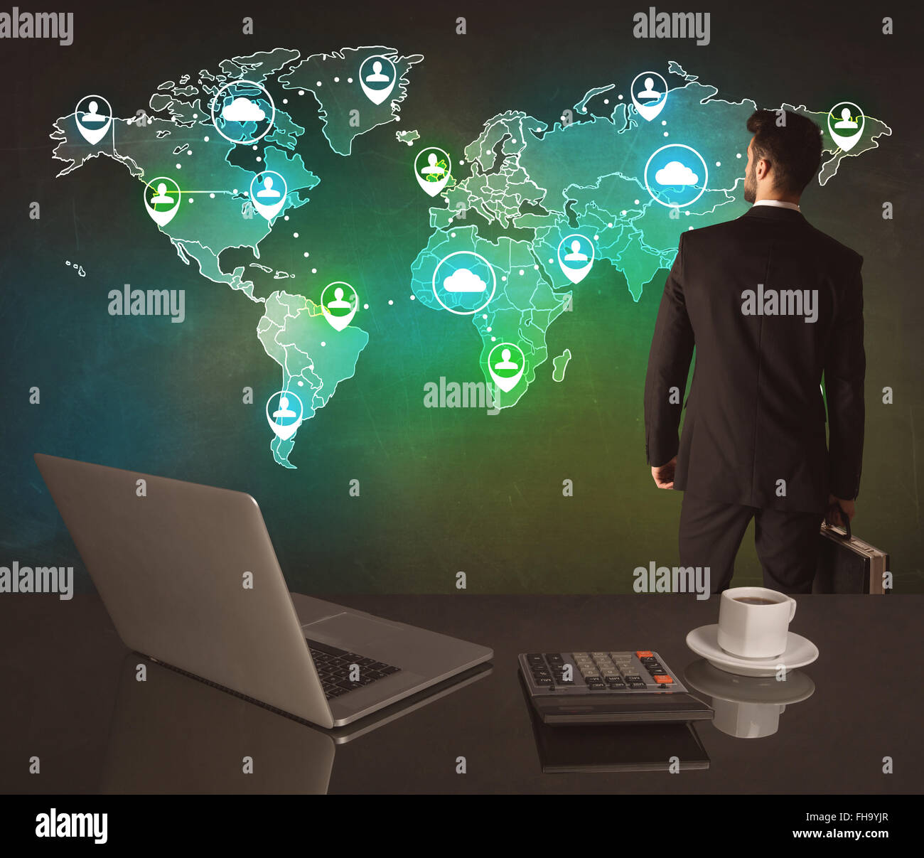 Salesman drawing on world map at office Stock Photo - Alamy