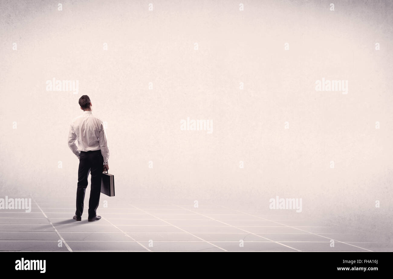 Business person standing in empty space Stock Photo - Alamy