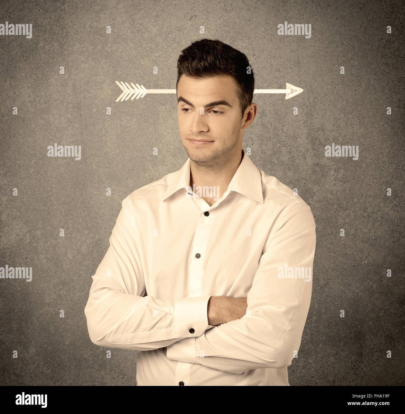 Young sales guy with arrow in the head Stock Photo - Alamy