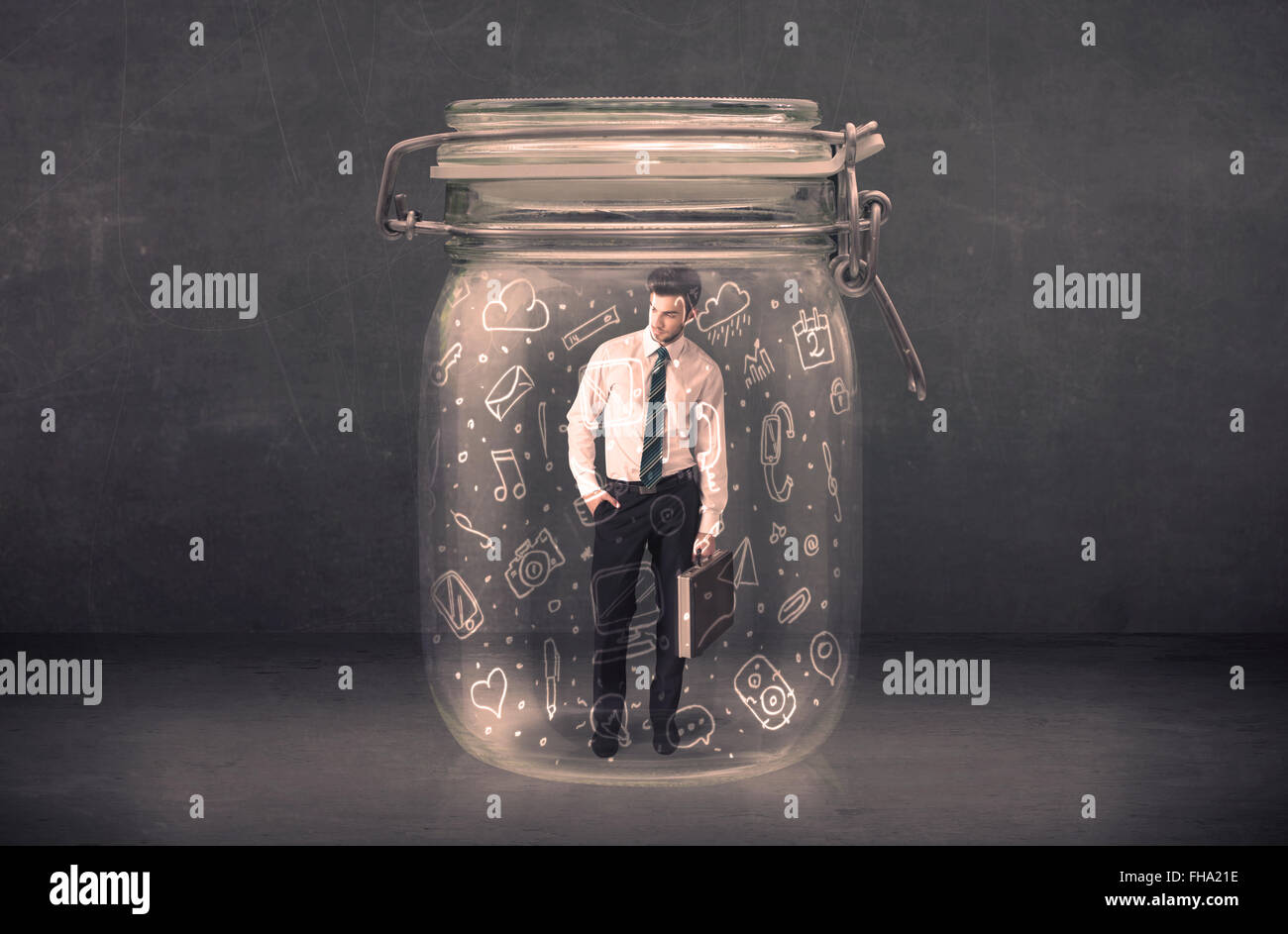 Business man captured in glass jar with hand drawn media icons concept ...