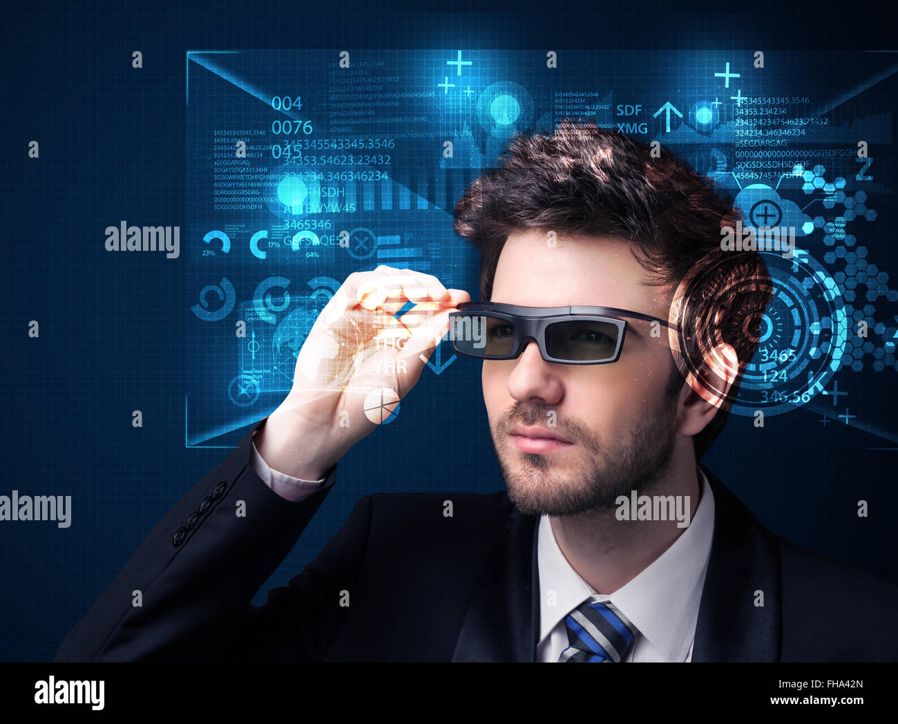 Young man looking with futuristic smart high tech glasses Stock Photo ...