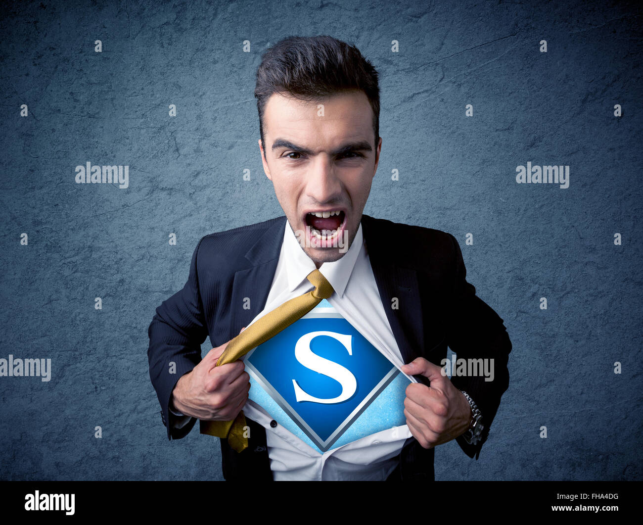 Businessman ripping off his shirt with superhero sign Stock Photo - Alamy