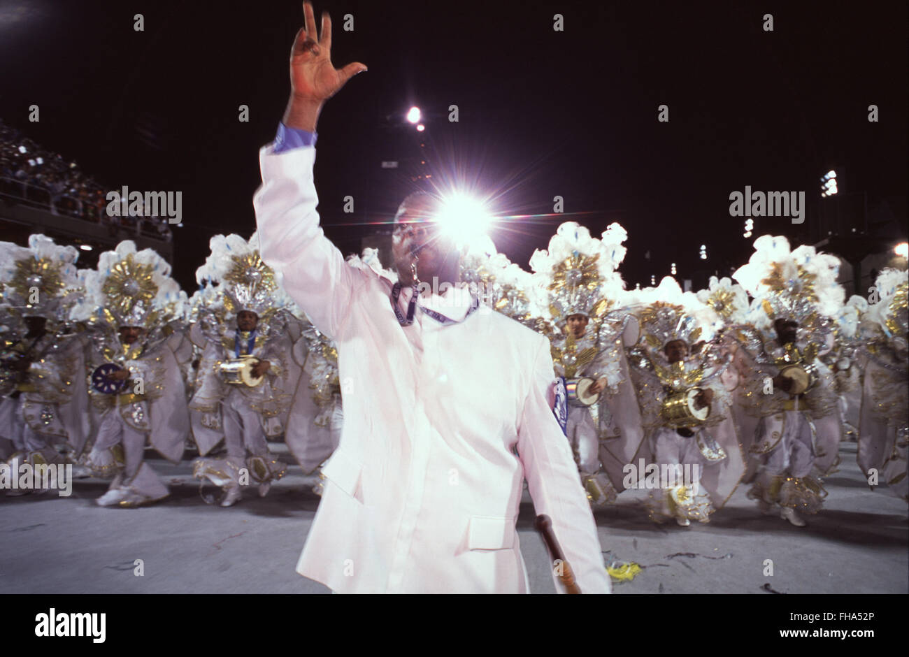 Samba Schools Parade, conductor commading drummers playing samba ...