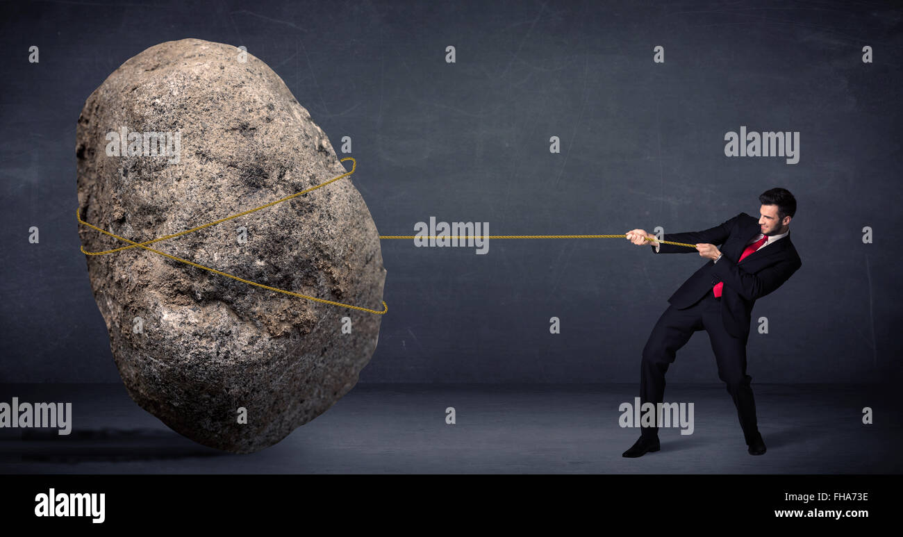 Pulling huge rock hi-res stock photography and images - Alamy