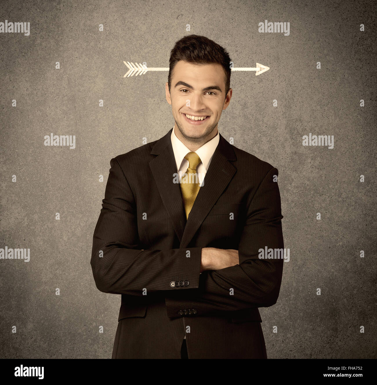 Young sales guy with arrow in the head Stock Photo - Alamy