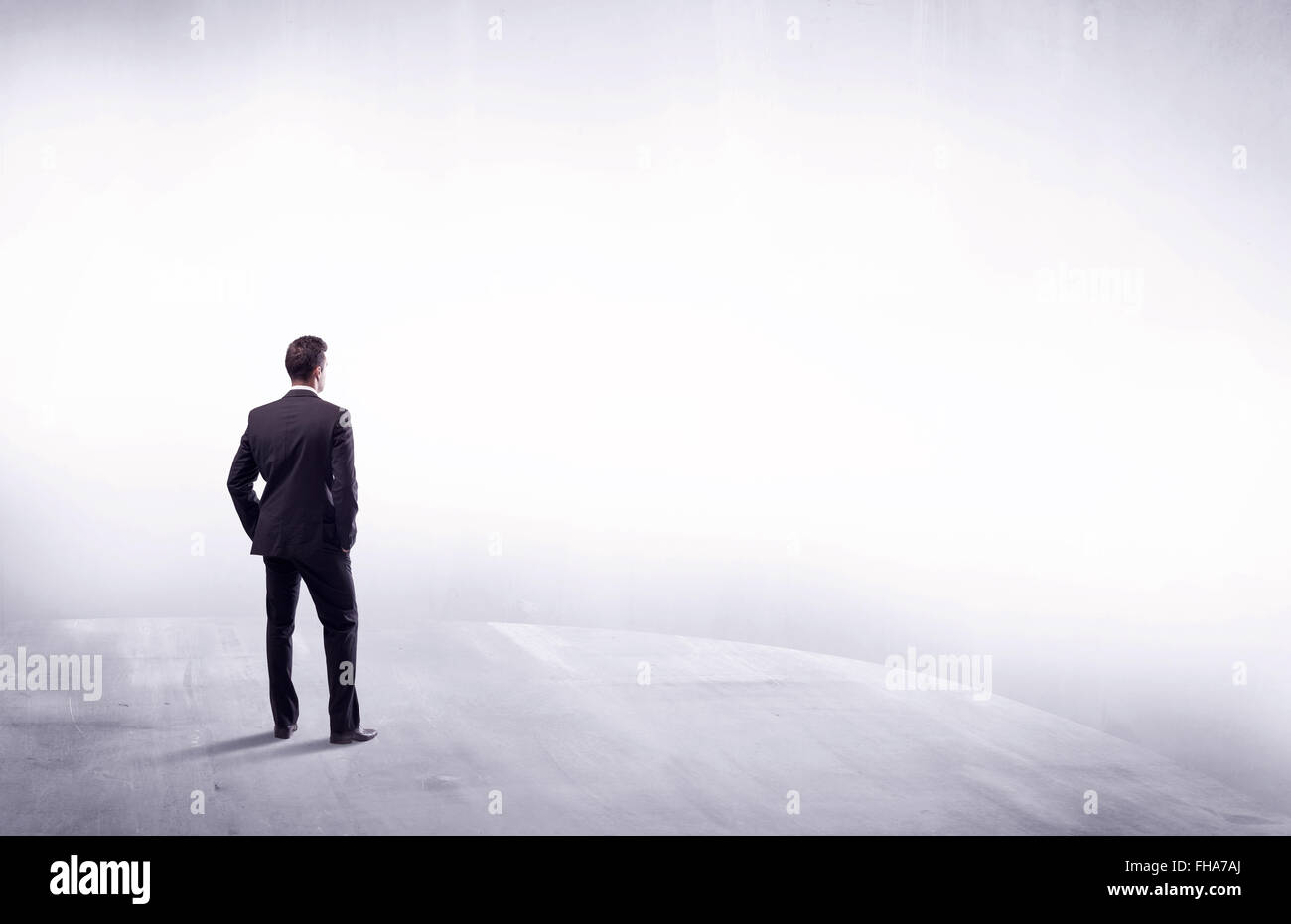 Business person standing from rear view Stock Photo - Alamy