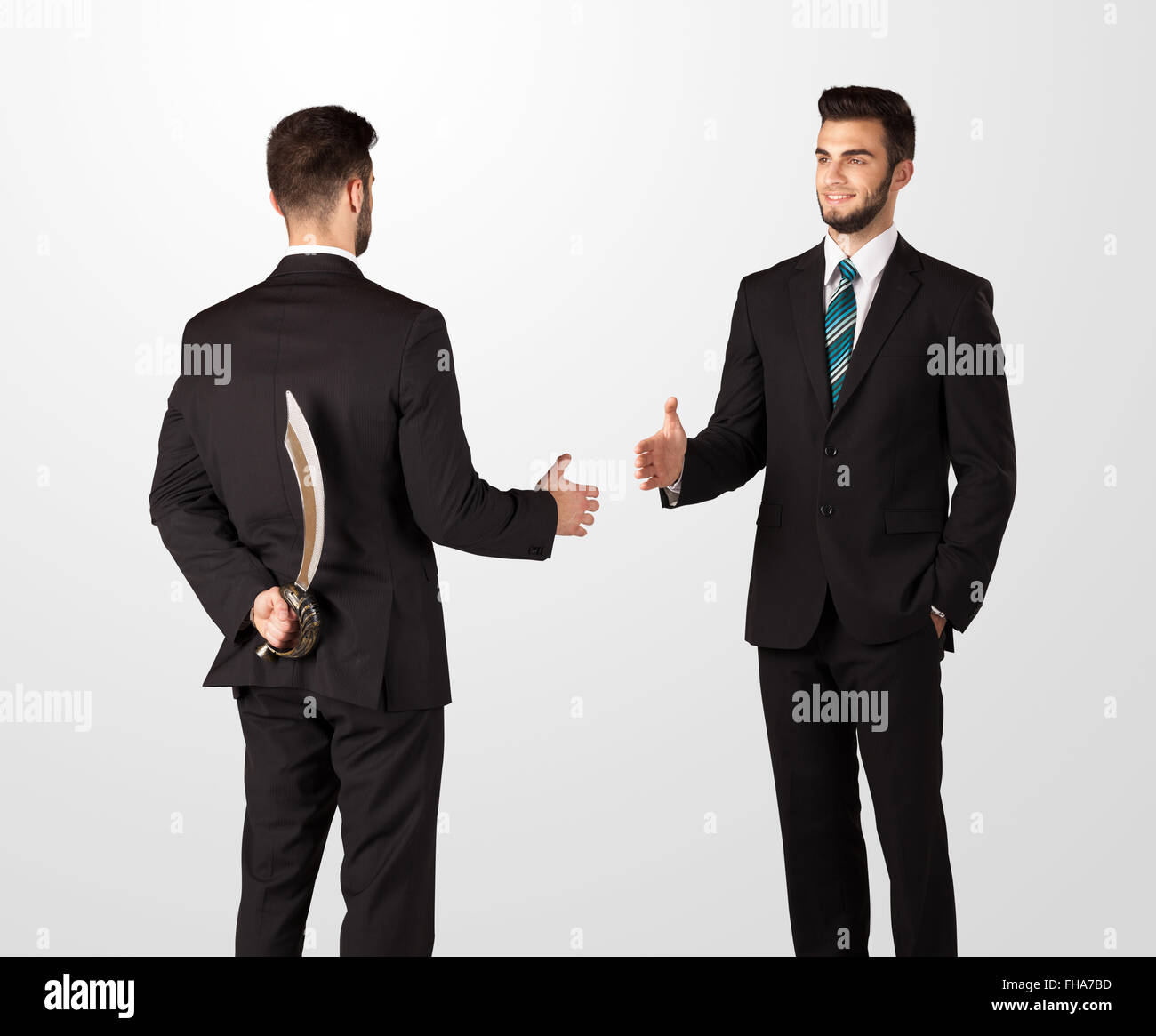Two businessman shake hands Stock Photo - Alamy