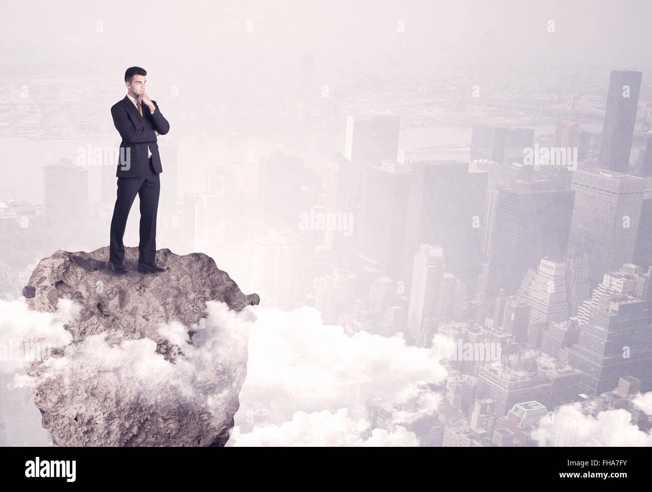 Person standing on rock hi-res stock photography and images - Alamy