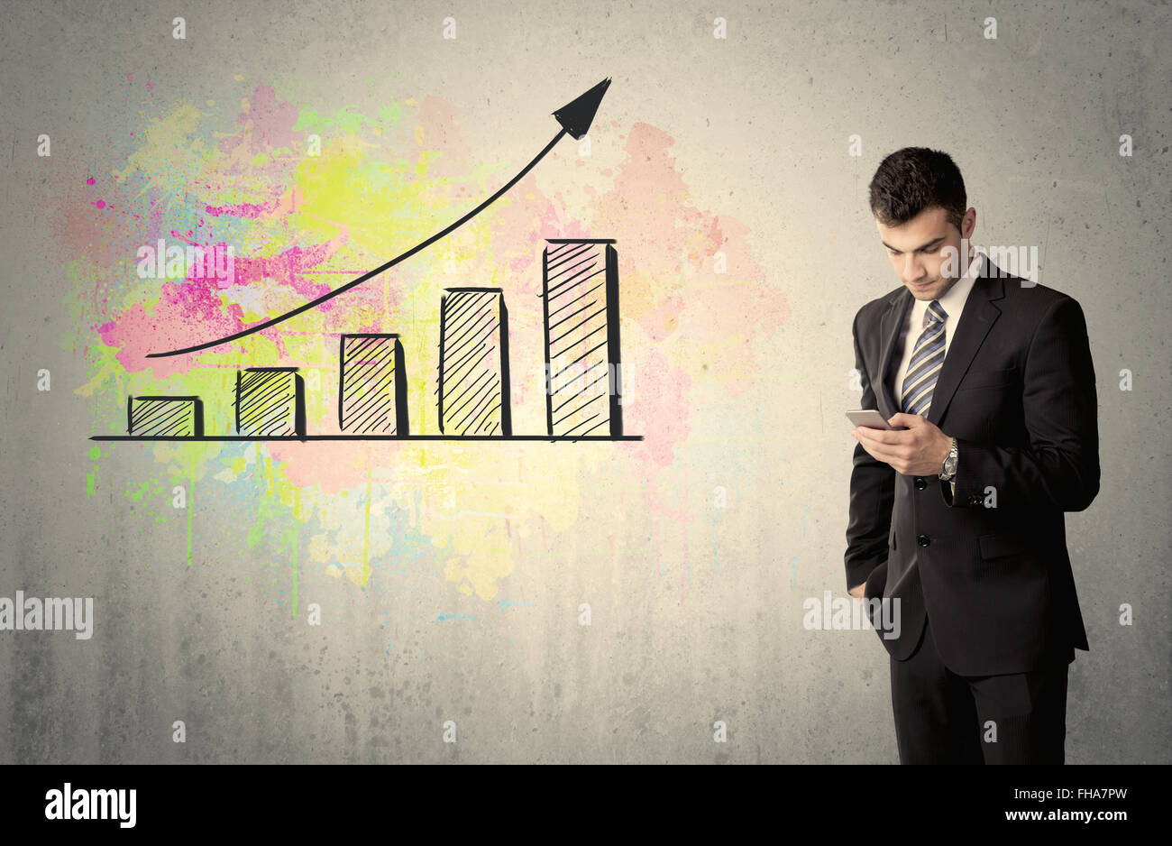 Happy businessman with colorful chart Stock Photo - Alamy