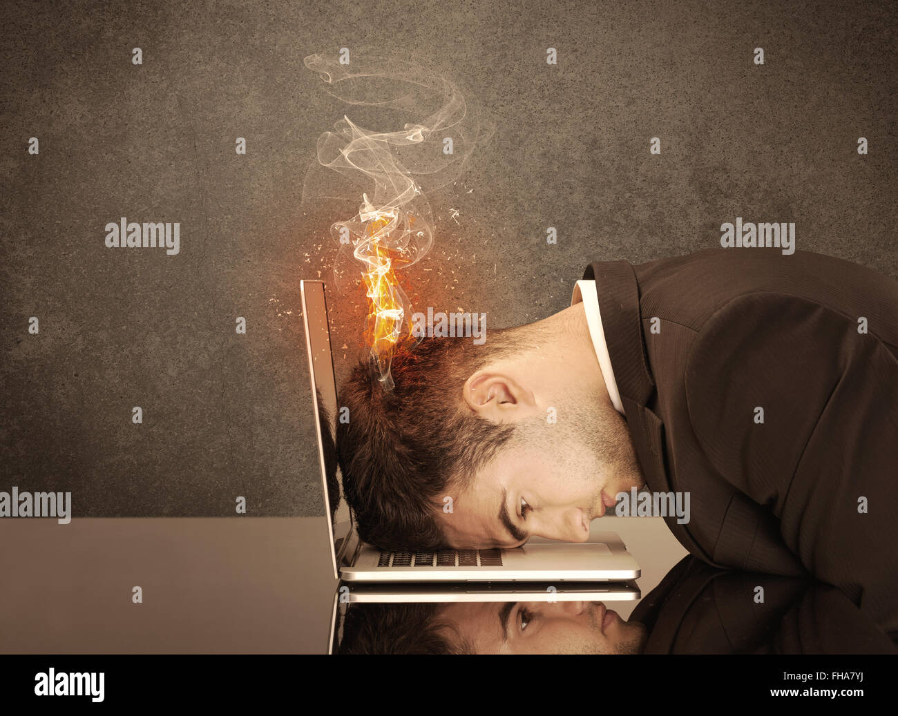 Sad business person's head catching fire Stock Photo - Alamy
