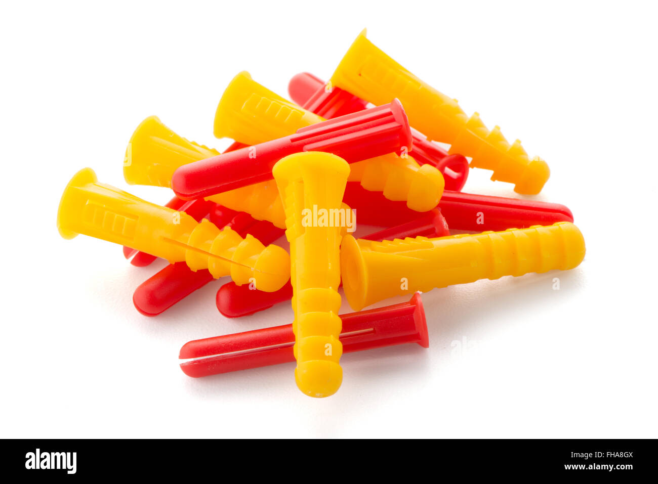 Closeup of colorful plastic dowels isolated on white background Stock ...