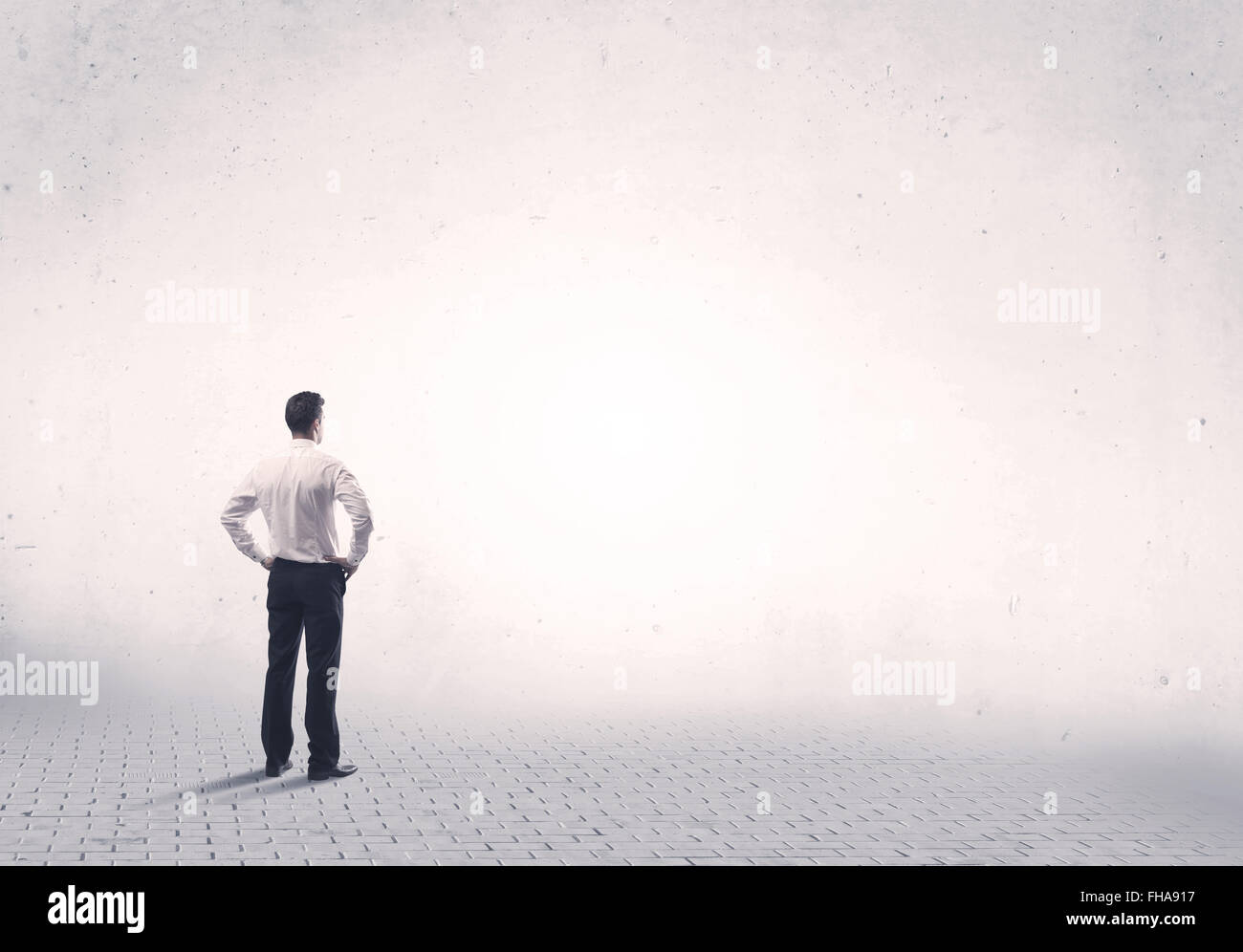 Elegant person standing with his back Stock Photo - Alamy