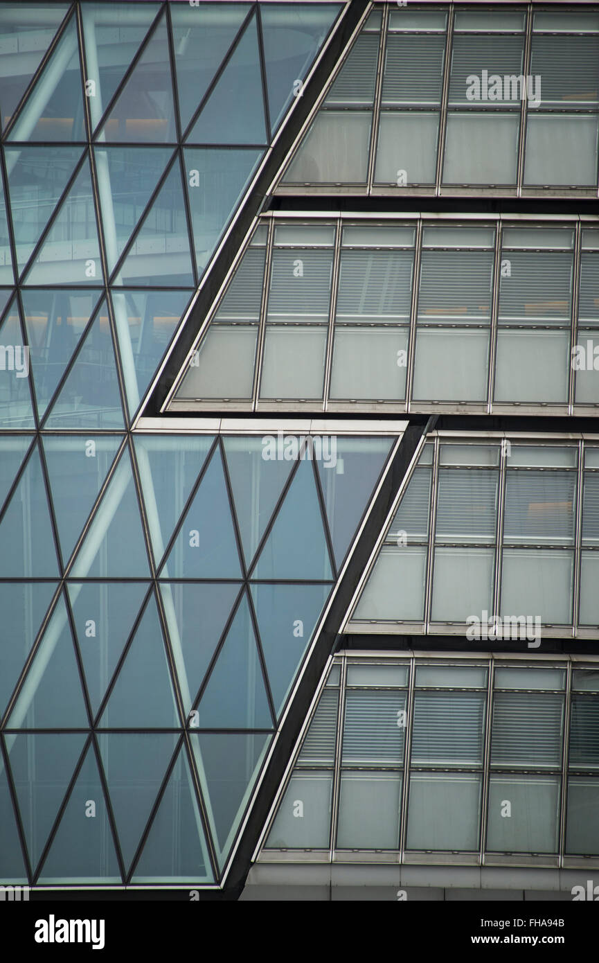 Close up of County Hall faceted rectangular and triangular glass facade ...