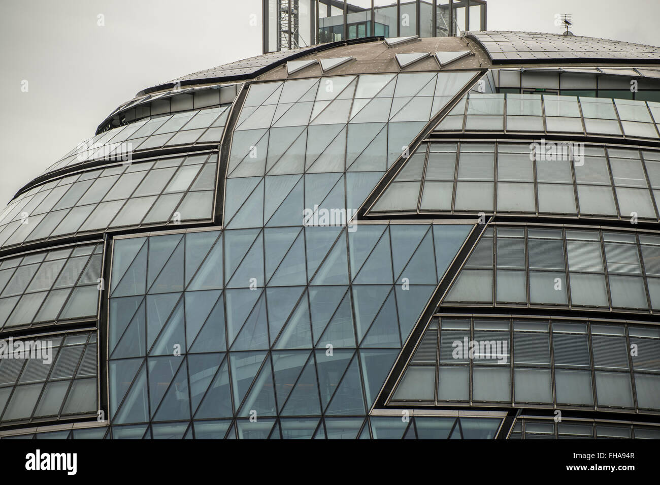 Close up of County Hall faceted rectangular and triangular glass facade ...