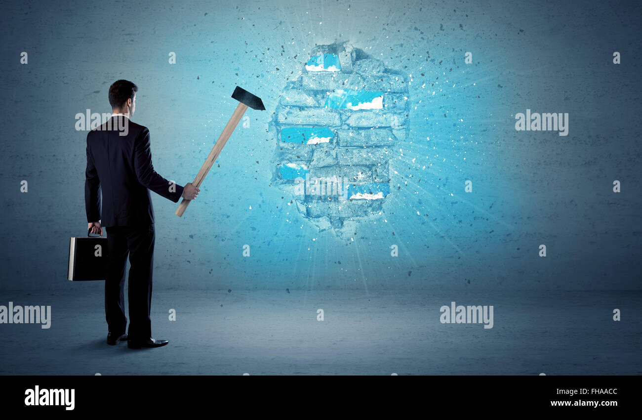 Business man hitting wall hammer hi-res stock photography and images ...