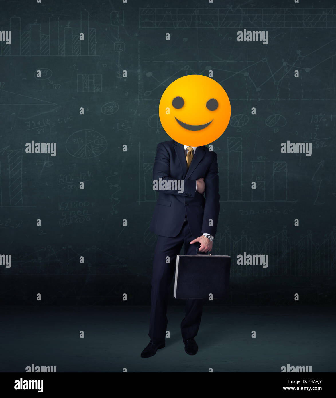 businessman wears yellow smiley face Stock Photo - Alamy