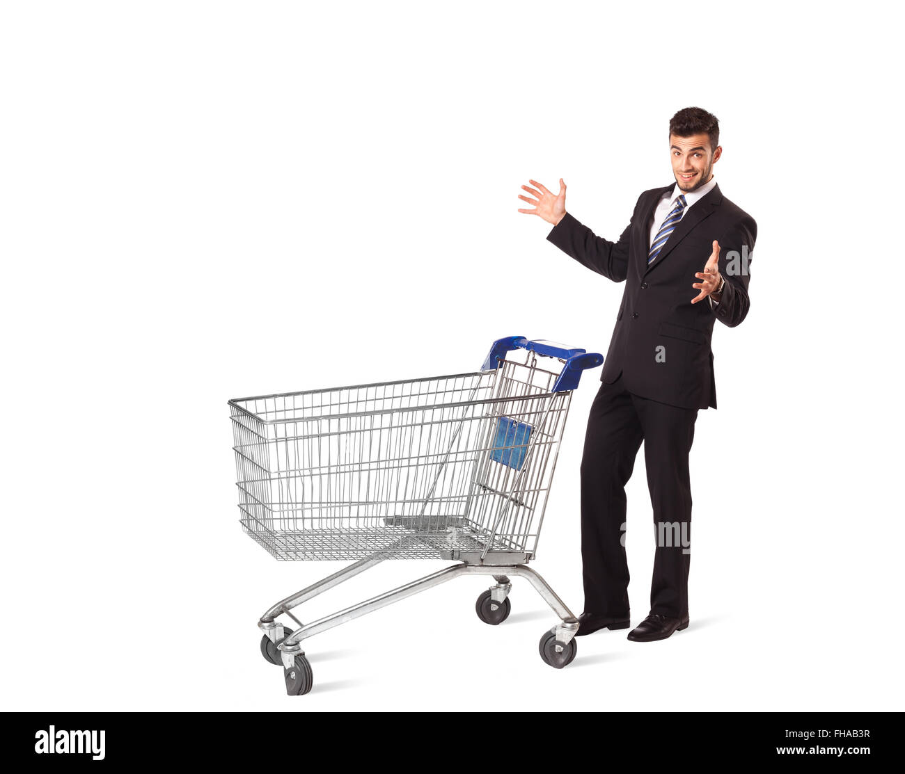 Businessman with shopping cart Stock Photo - Alamy