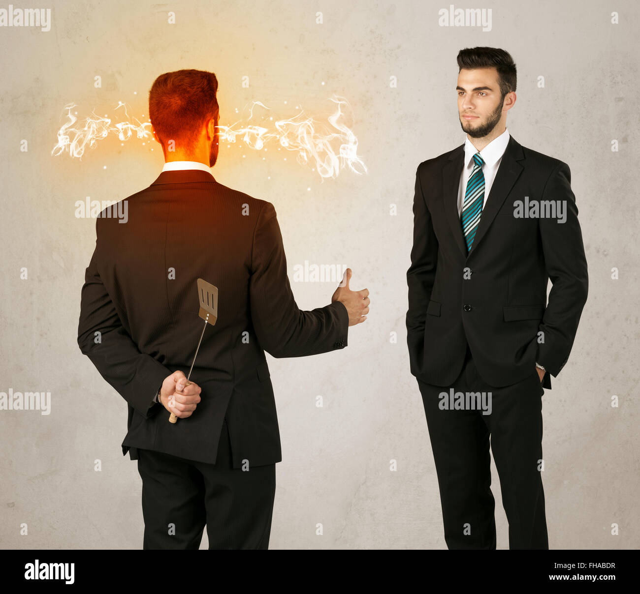 Angry businessman with weapon Stock Photo - Alamy