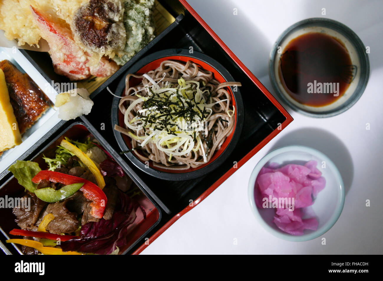Detail of a Japanese Bento Box, full of perfect japanese food including ...