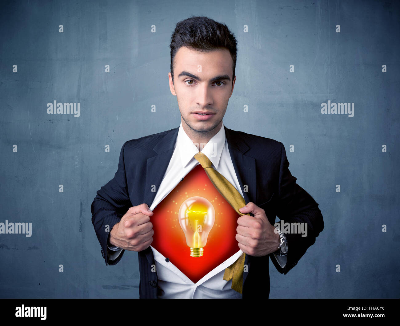 Superhero man ripping open shirt hi-res stock photography and images ...