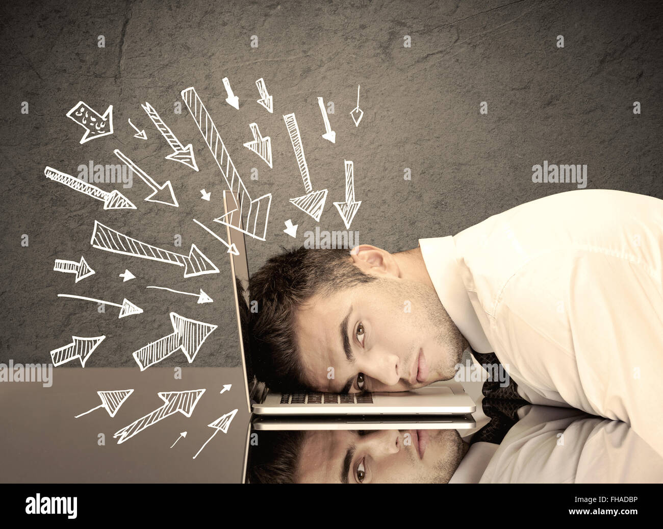 Arrows pointing at sad office worker Stock Photo - Alamy