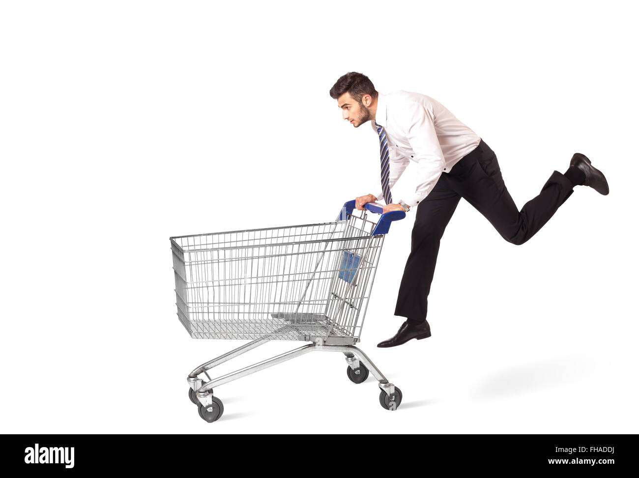 Businessman with shopping cart Stock Photo - Alamy