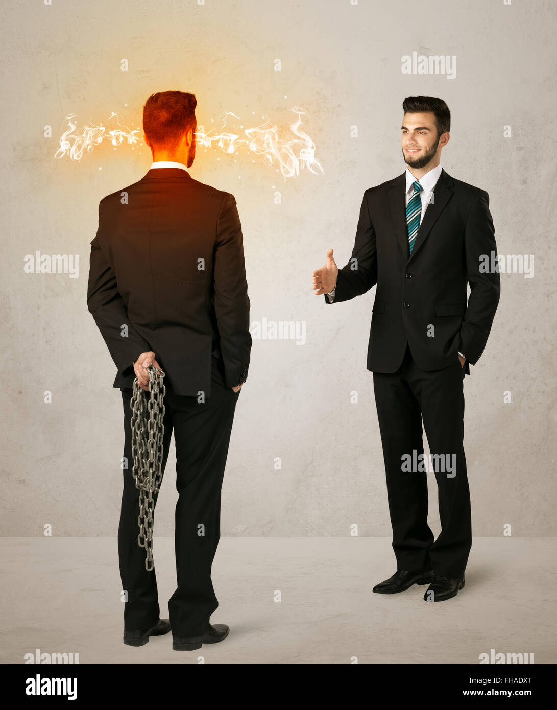 Angry businessman with weapon Stock Photo - Alamy