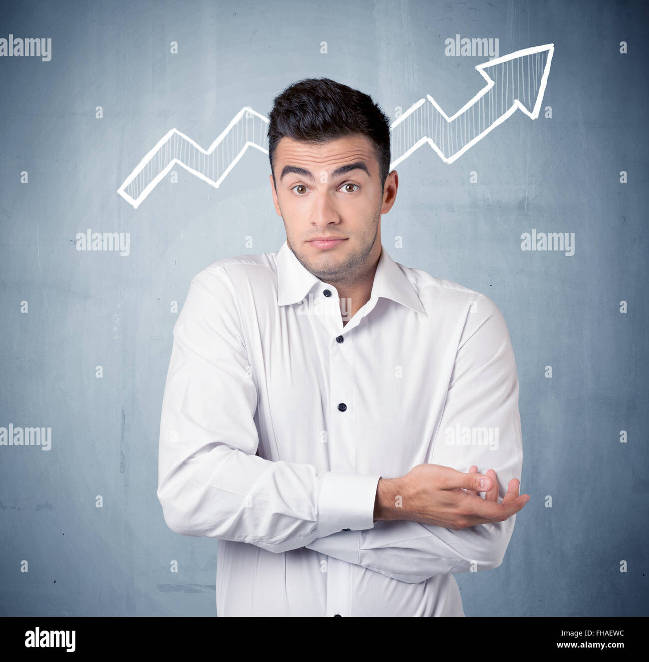 Smiling business guy with graph arrow Stock Photo - Alamy