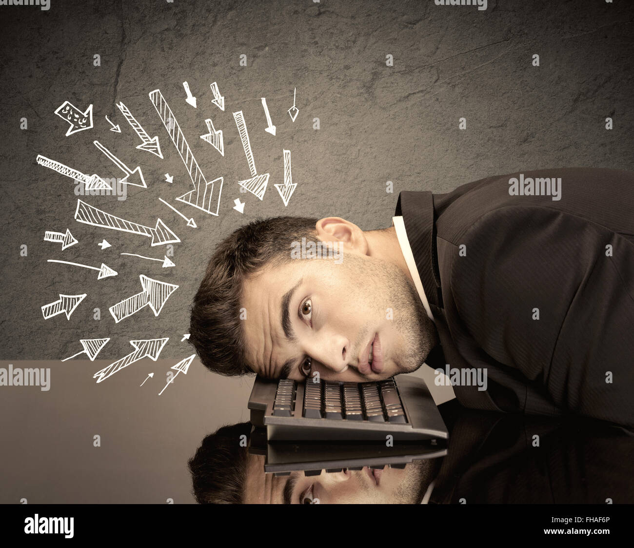 Arrows pointing at sad office worker Stock Photo - Alamy