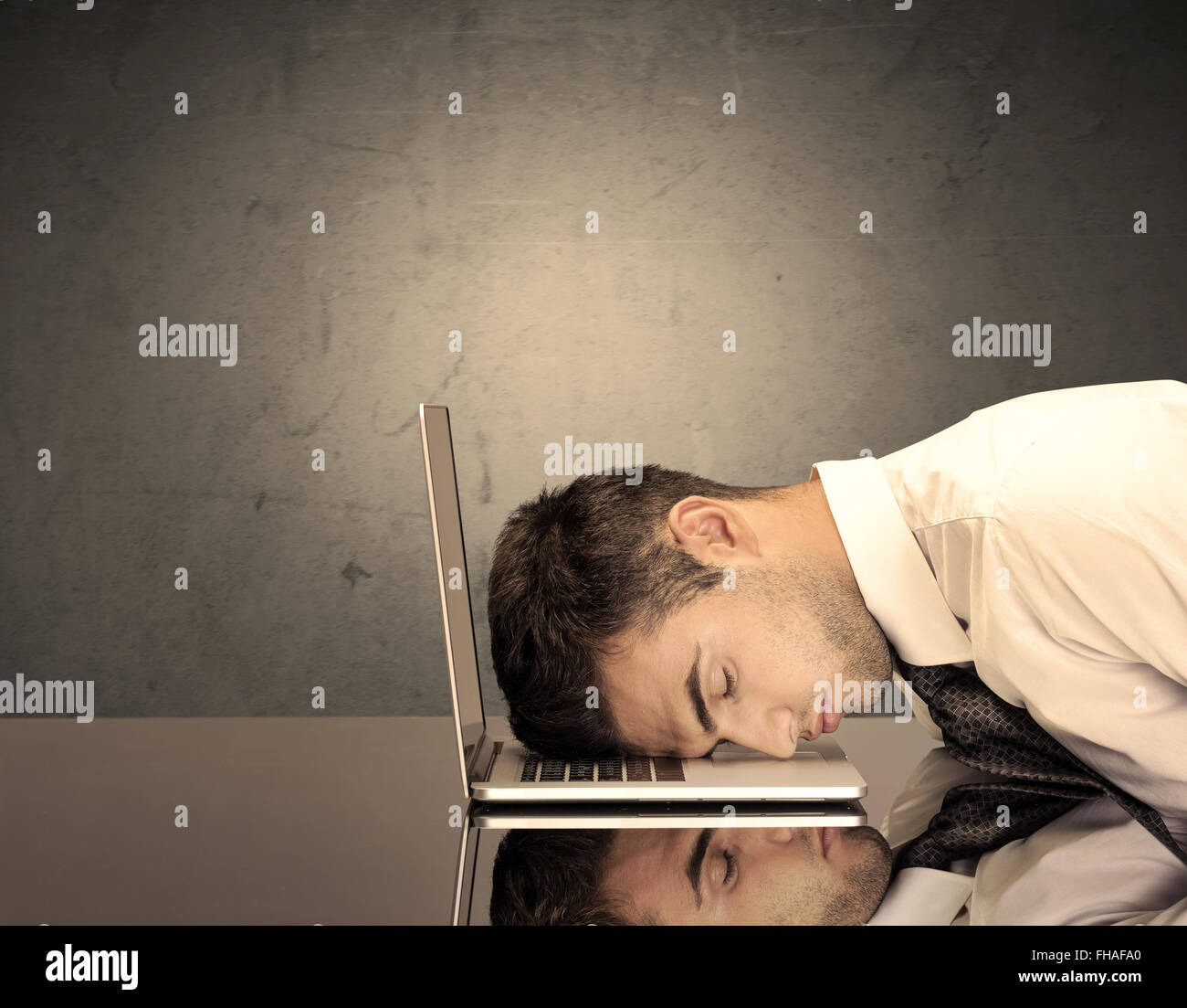 Frustrated businessman's head on keyboard Stock Photo - Alamy