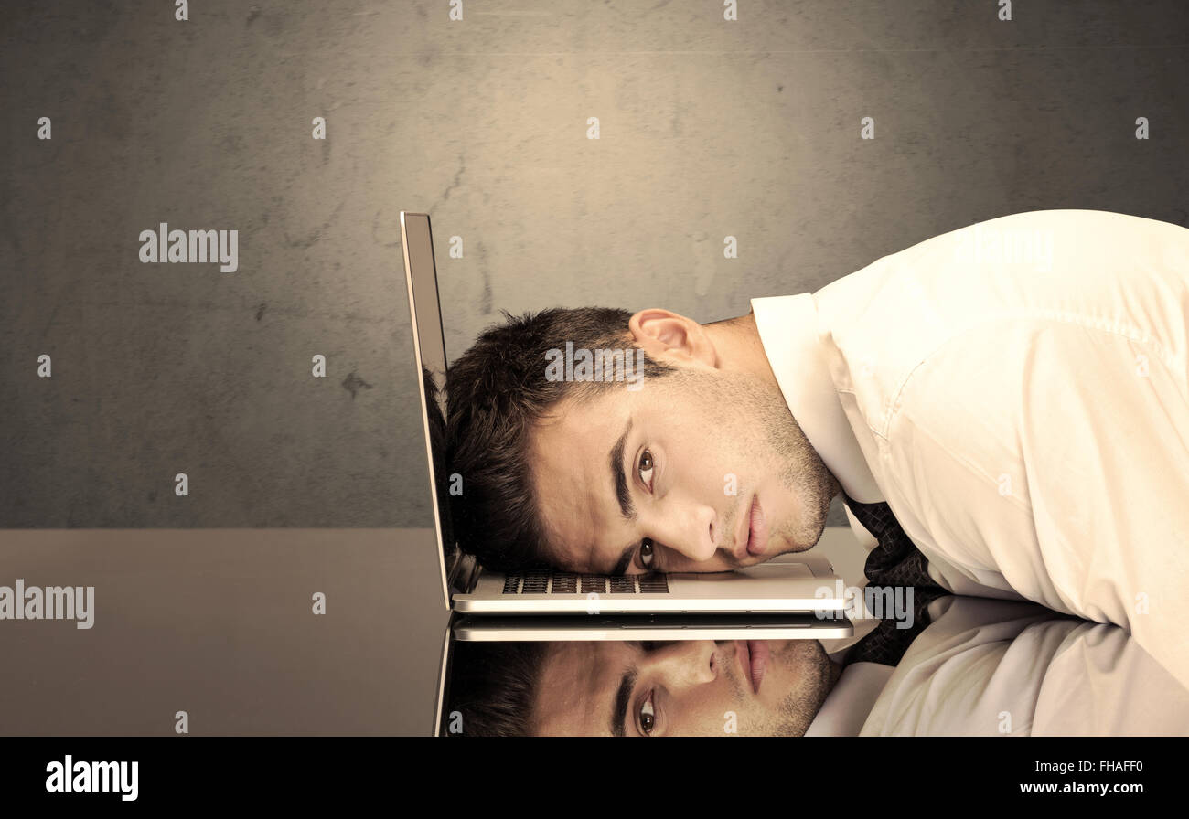 Frustrated businessman banging head hi-res stock photography and images ...