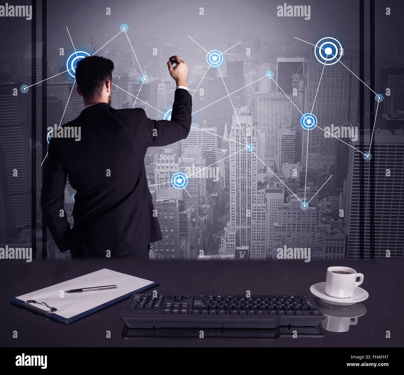 Salesman drawing strategy at office meeting Stock Photo - Alamy