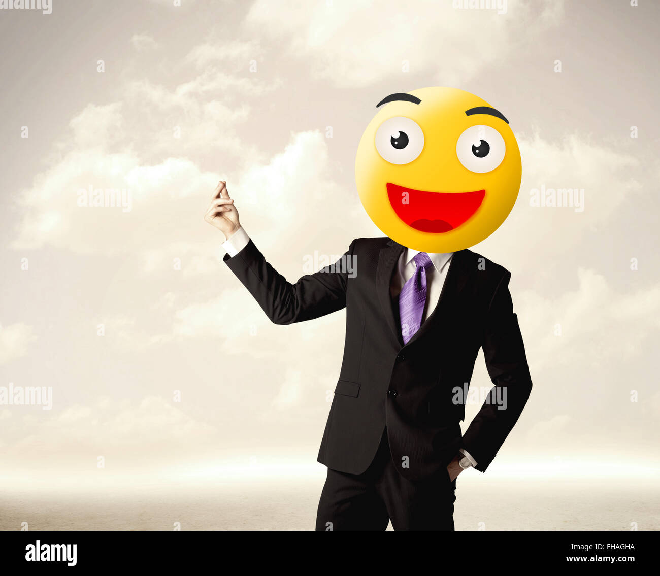 businessman wears yellow smiley face Stock Photo - Alamy