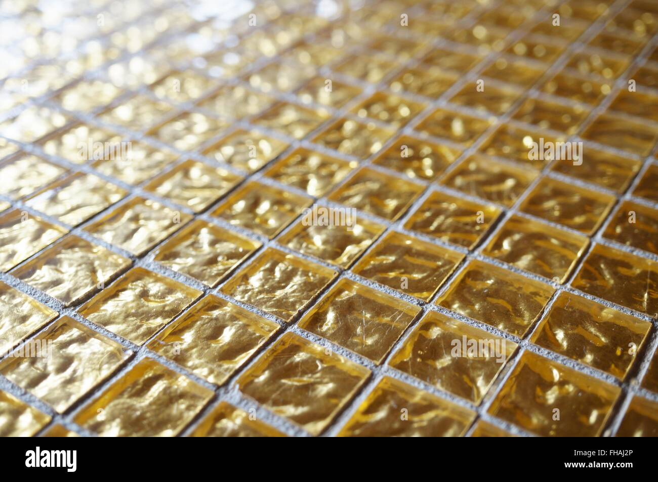 Golden square ceramic tile texture hi-res stock photography and images ...
