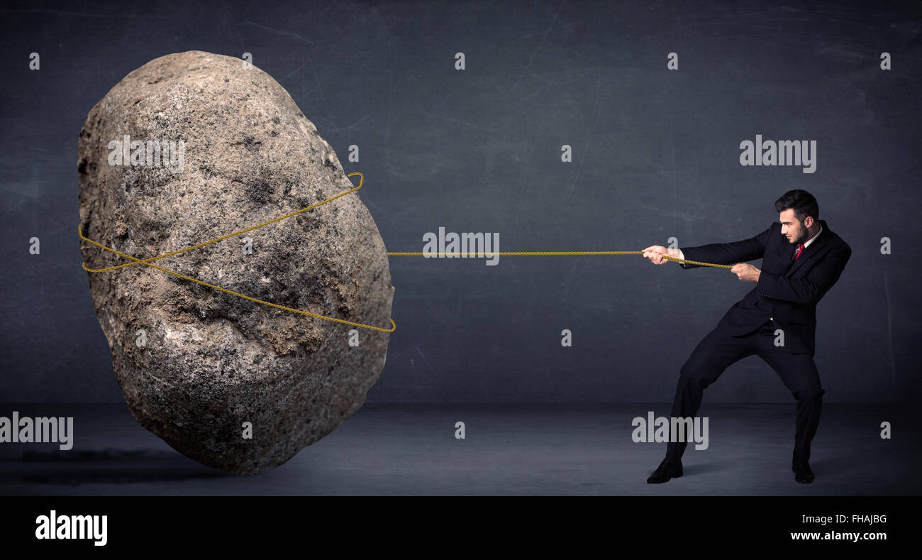 Pulling huge rock hi-res stock photography and images - Alamy
